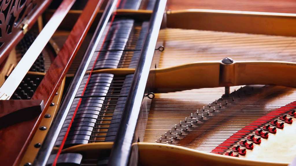 Why Grand Pianos Are Heavier Than Upright Pianos | K&M Music School